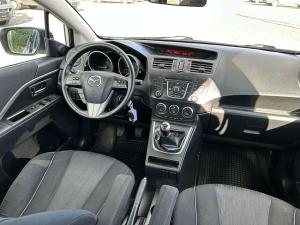 White Mazda 5 2012 in Kretinga, with an engine capacity of 1.56 L and mileage of 228 thousand km for 3950 €, photo 20 on AUTOMOTO.COM.LV