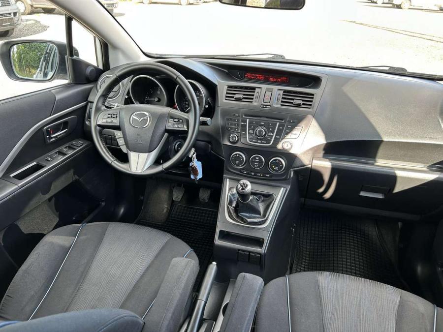 White Mazda 5 2012 in Kretinga, with an engine capacity of 1.56 L and mileage of 228 thousand km for 3950 €, photo 20 on AUTOMOTO.COM.LV