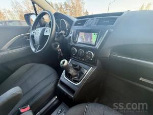 White Mazda 5 2015 in Riga, with an engine capacity of 1.60 L and mileage of 0 thousand km for 4990 €, photo 18 on AUTOMOTO.COM.LV