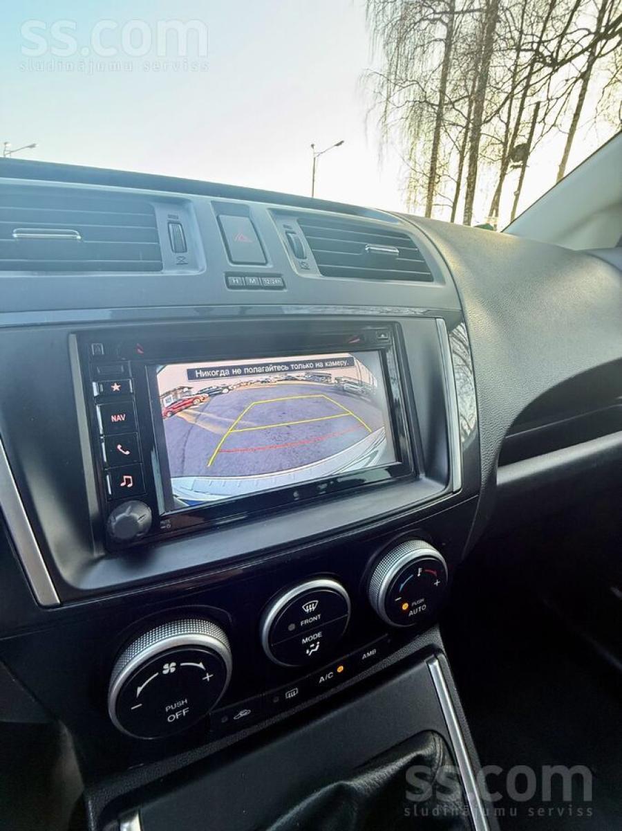 White Mazda 5 2015 in Riga, with an engine capacity of 1.60 L and mileage of 0 thousand km for 4990 €, photo 25 on AUTOMOTO.COM.LV