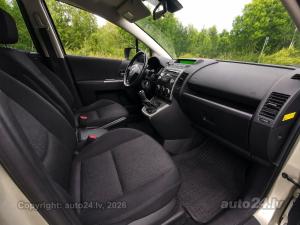 Yellow Mazda 5 2009 in Tartu, with an engine capacity of 2.00 L and mileage of 220 thousand km for 890 €, photo 6 on AUTOMOTO.COM.LV