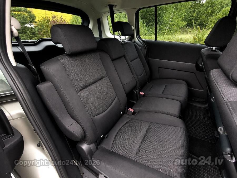 Yellow Mazda 5 2009 in Tartu, with an engine capacity of 2.00 L and mileage of 220 thousand km for 890 €, photo 7 on AUTOMOTO.COM.LV
