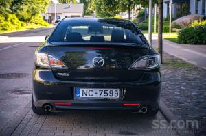 Black Mazda 6 2008 in Riga, with an engine capacity of 2.50 L and mileage of 279 thousand km for 990 €, photo 6 on AUTOMOTO.COM.LV