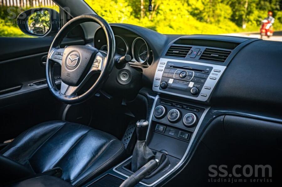 Black Mazda 6 2008 in Riga, with an engine capacity of 2.50 L and mileage of 279 thousand km for 990 €, photo 8 on AUTOMOTO.COM.LV