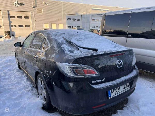 Black Mazda 6 2009 in Vilnius, with an engine capacity of 2.20 L and mileage of 289 thousand km for 950 €, photo 5 on AUTOMOTO.COM.LV