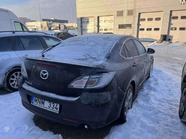 Black Mazda 6 2009 in Vilnius, with an engine capacity of 2.20 L and mileage of 289 thousand km for 950 €, photo 6 on AUTOMOTO.COM.LV
