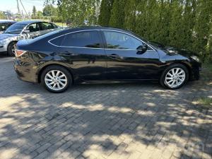 Black Mazda 6 2010 in Riga, with an engine capacity of 2.00 L and mileage of 340 thousand km for 2450 €, photo 8 on AUTOMOTO.COM.LV
