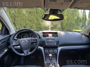 Black Mazda 6 2010 in Riga, with an engine capacity of 2.00 L and mileage of 340 thousand km for 2450 €, photo 11 on AUTOMOTO.COM.LV