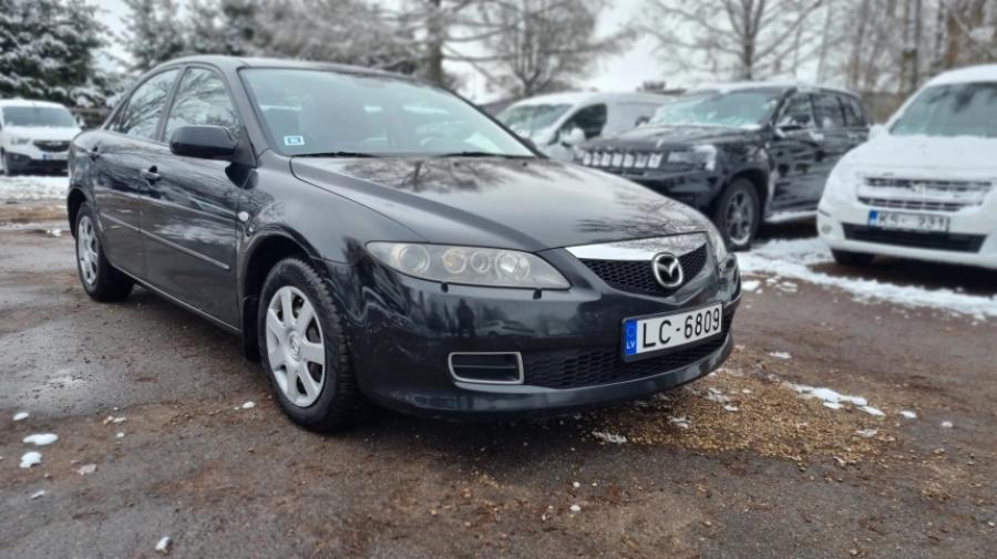 Black Mazda 6 2005 in Riga, with an engine capacity of 2.00 L and mileage of 171 thousand km for 1770 €, photo 9 on AUTOMOTO.COM.LV
