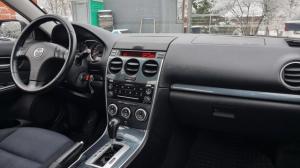 Black Mazda 6 2005 in Riga, with an engine capacity of 2.00 L and mileage of 171 thousand km for 1770 €, photo 11 on AUTOMOTO.COM.LV