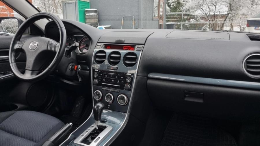 Black Mazda 6 2005 in Riga, with an engine capacity of 2.00 L and mileage of 171 thousand km for 1770 €, photo 11 on AUTOMOTO.COM.LV