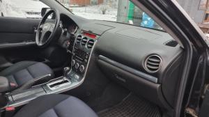 Black Mazda 6 2005 in Riga, with an engine capacity of 2.00 L and mileage of 171 thousand km for 1770 €, photo 12 on AUTOMOTO.COM.LV