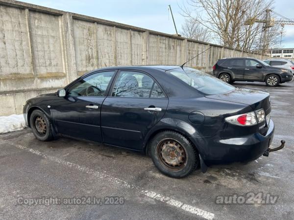 Black Mazda 6 2007 in Tallinn, with an engine capacity of 1.80 L and mileage of 165 thousand km for 590 €, photo 4 on AUTOMOTO.COM.LV