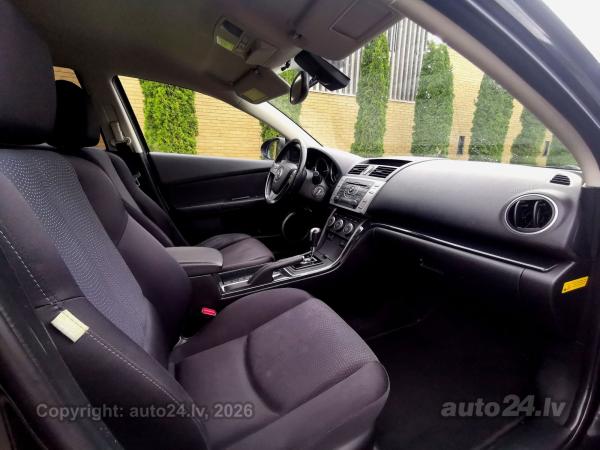 Black Mazda 6 2008 in Tartu, with an engine capacity of 2.00 L and mileage of 260 thousand km for 2390 €, photo 5 on AUTOMOTO.COM.LV