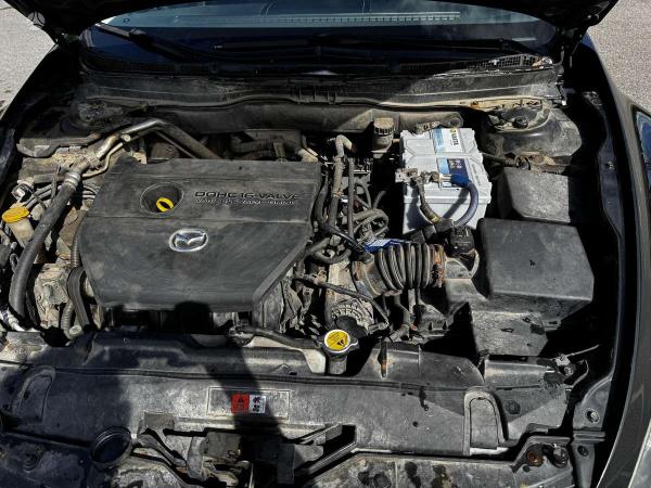 Black Mazda 6 2008 in Kaunas, with an engine capacity of 2.00 L and mileage of 234 thousand km for 1800 €, photo 6 on AUTOMOTO.COM.LV
