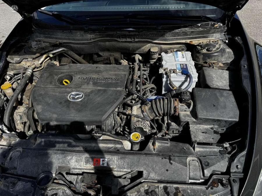 Black Mazda 6 2008 in Kaunas, with an engine capacity of 2.00 L and mileage of 234 thousand km for 1800 €, photo 7 on AUTOMOTO.COM.LV