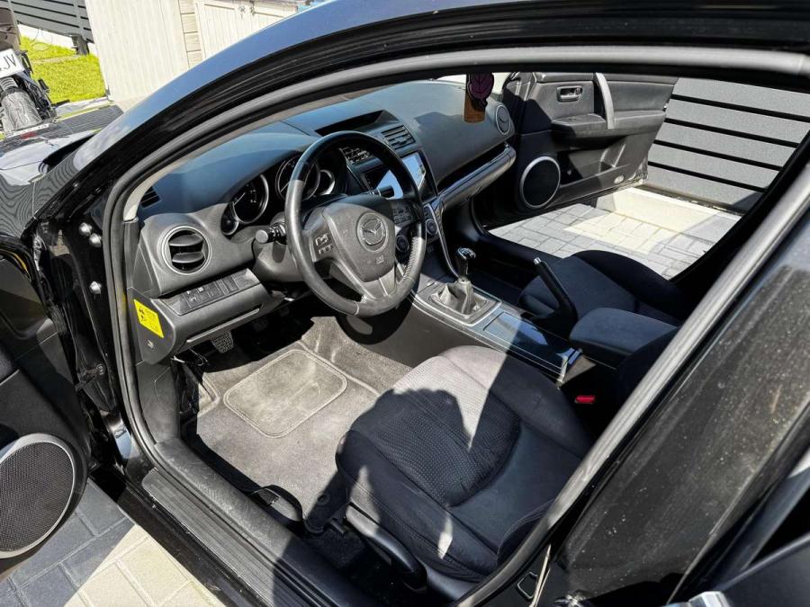 Black Mazda 6 2008 in Kaunas, with an engine capacity of 2.00 L and mileage of 234 thousand km for 1800 €, photo 10 on AUTOMOTO.COM.LV