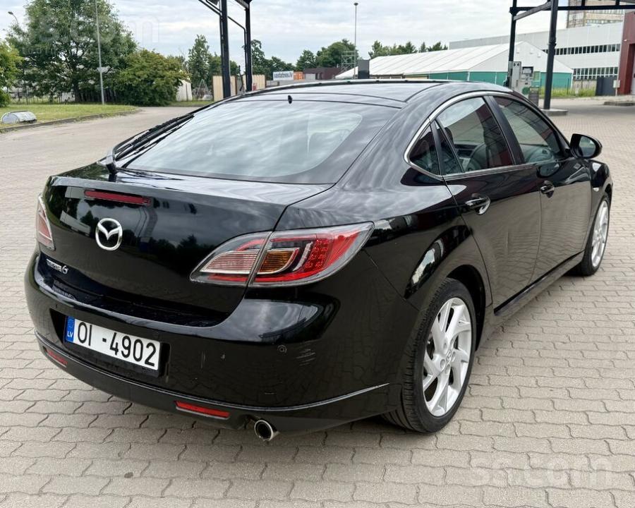 Black Mazda 6 2008 in Riga, with an engine capacity of 2.00 L and mileage of 268 thousand km for 1650 €, photo 5 on AUTOMOTO.COM.LV