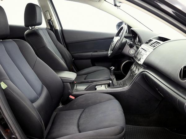 Black Mazda 6 2008 in Tallinn, with an engine capacity of 1.80 L and mileage of 286 thousand km for 899 €, photo 6 on AUTOMOTO.COM.LV