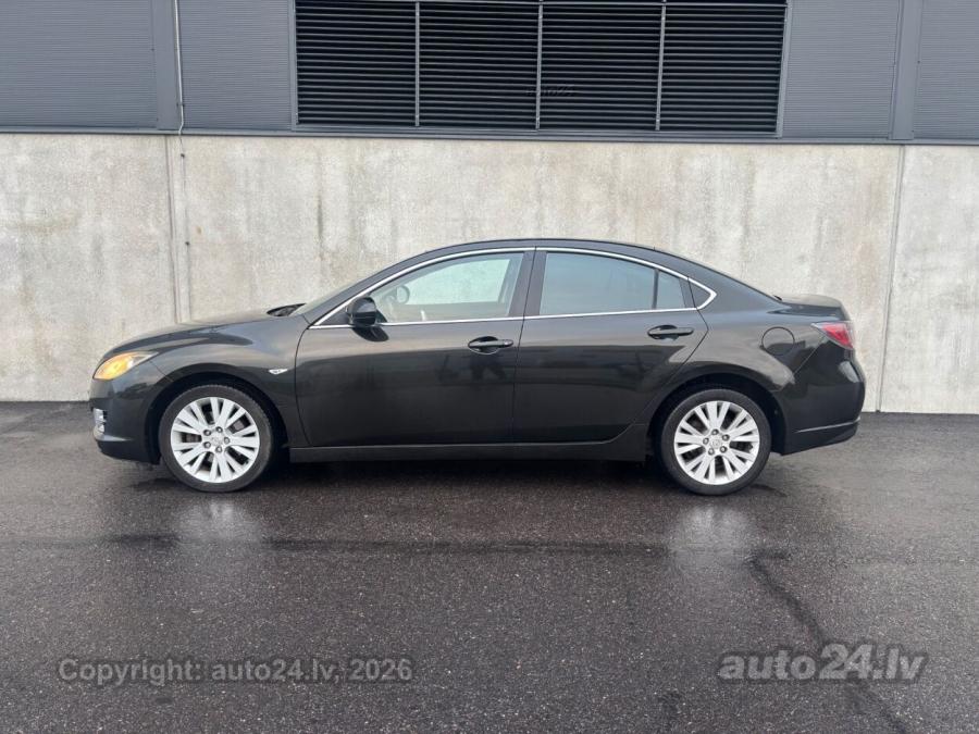 Black Mazda 6 2010 in Tartu, with an engine capacity of 2.20 L and mileage of 300 thousand km for 2499 €, photo 6 on AUTOMOTO.COM.LV