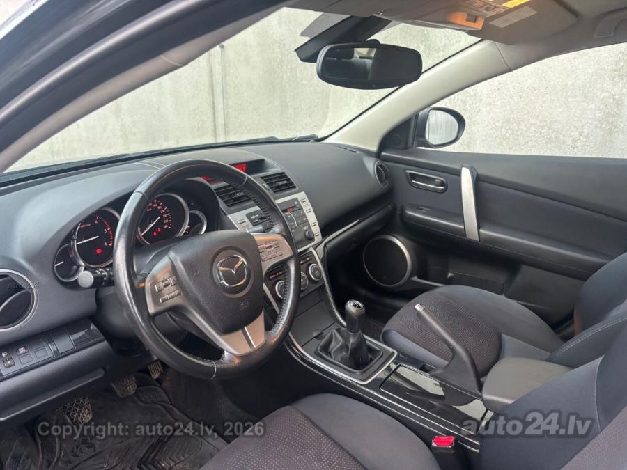 Black Mazda 6 2010 in Tartu, with an engine capacity of 2.20 L and mileage of 300 thousand km for 2499 €, photo 8 on AUTOMOTO.COM.LV
