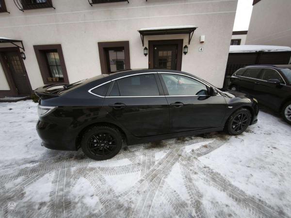 Black Mazda 6 2011 in Kaunas, with an engine capacity of 2.18 L and mileage of 243 thousand km for 3200 €, photo 3 on AUTOMOTO.COM.LV