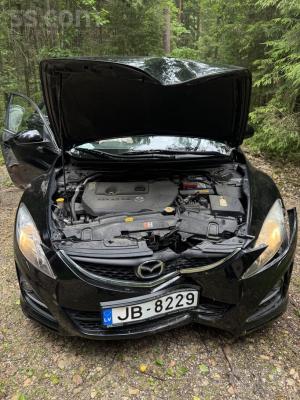 Black Mazda 6 2012 in Riga, with an engine capacity of 2.00 L and mileage of 119 thousand km for 1300 €, photo 3 on AUTOMOTO.COM.LV