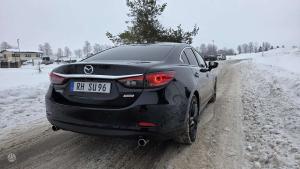 Black Mazda 6 2013 in Plunge, with an engine capacity of 2.18 L and mileage of 185 thousand km for 6700 €, photo 3 on AUTOMOTO.COM.LV