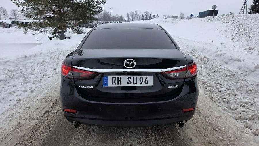Black Mazda 6 2013 in Plunge, with an engine capacity of 2.18 L and mileage of 185 thousand km for 6700 €, photo 5 on AUTOMOTO.COM.LV