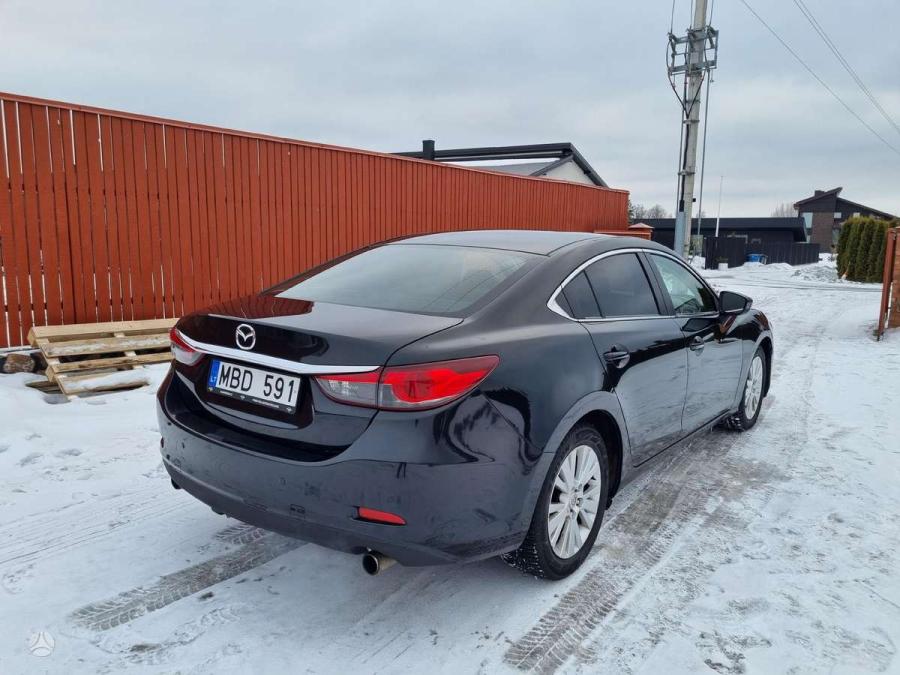Black Mazda 6 2013 in Alytus, with an engine capacity of 2.19 L and mileage of 248 thousand km for 3200 €, photo 4 on AUTOMOTO.COM.LV