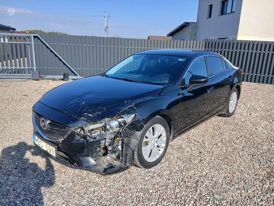Black Mazda 6 2013 in Alytus, with an engine capacity of 2.18 L and mileage of 248 thousand km for 2900 €, photo 4 on AUTOMOTO.COM.LV