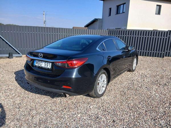 Black Mazda 6 2013 in Alytus, with an engine capacity of 2.18 L and mileage of 248 thousand km for 2900 €, photo 4 on AUTOMOTO.COM.LV