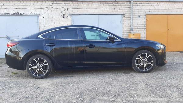 Black Mazda 6 2014 in Vilnius, with an engine capacity of 2.19 L and mileage of 299 thousand km for 3250 €, photo 4 on AUTOMOTO.COM.LV