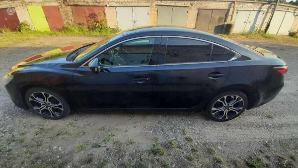 Black Mazda 6 2014 in Vilnius, with an engine capacity of 2.19 L and mileage of 299 thousand km for 3250 €, photo 5 on AUTOMOTO.COM.LV