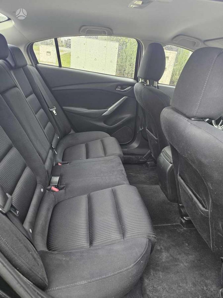Black Mazda 6 2015 in Kaunas, with an engine capacity of 2.49 L and mileage of 145 thousand km for 7900 €, photo 14 on AUTOMOTO.COM.LV