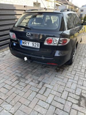Black Mazda 6 2003 in Kaunas, with an engine capacity of 1.80 L and mileage of 228 thousand km for 1350 €, photo 3 on AUTOMOTO.COM.LV