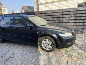 Black Mazda 6 2003 in Kaunas, with an engine capacity of 1.80 L and mileage of 228 thousand km for 1350 €, photo 4 on AUTOMOTO.COM.LV