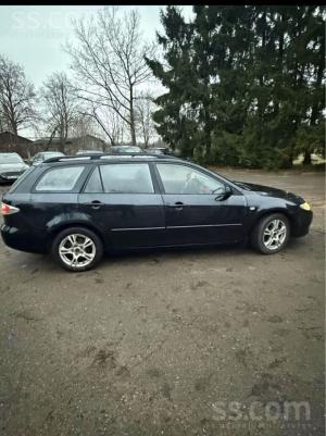 Black Mazda 6 2005 in Talsi, with an engine capacity of 2.00 L and mileage of 283 thousand km for 980 €, photo 4 on AUTOMOTO.COM.LV