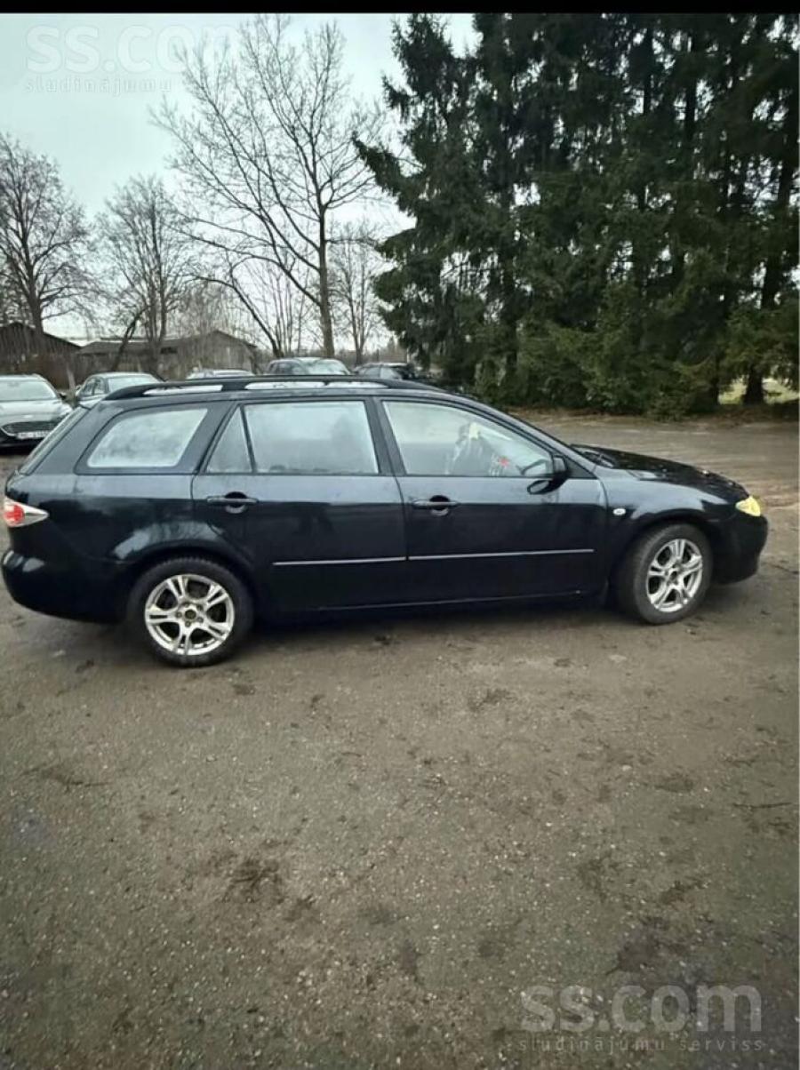 Black Mazda 6 2005 in Talsi, with an engine capacity of 2.00 L and mileage of 283 thousand km for 980 €, photo 4 on AUTOMOTO.COM.LV