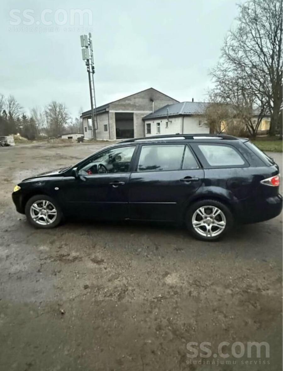 Black Mazda 6 2005 in Talsi, with an engine capacity of 2.00 L and mileage of 283 thousand km for 900 €, photo 5 on AUTOMOTO.COM.LV