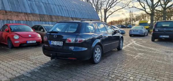 Black Mazda 6 2006 in Valmiera, with an engine capacity of 2.30 L and mileage of 235 thousand km for 1100 €, photo 3 on AUTOMOTO.COM.LV