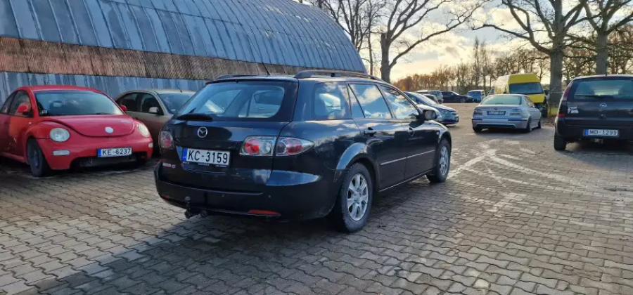 Black Mazda 6 2006 in Valmiera, with an engine capacity of 2.30 L and mileage of 235 thousand km for 1100 €, photo 4 on AUTOMOTO.COM.LV