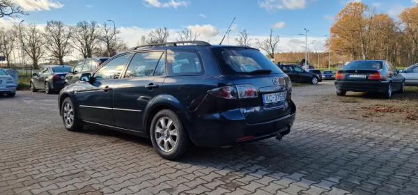 Black Mazda 6 2006 in Valmiera, with an engine capacity of 2.30 L and mileage of 235 thousand km for 1100 €, photo 4 on AUTOMOTO.COM.LV