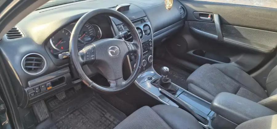 Black Mazda 6 2006 in Valmiera, with an engine capacity of 2.30 L and mileage of 235 thousand km for 1100 €, photo 8 on AUTOMOTO.COM.LV