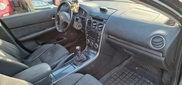 Black Mazda 6 2006 in Valmiera, with an engine capacity of 2.30 L and mileage of 235 thousand km for 1100 €, photo 8 on AUTOMOTO.COM.LV