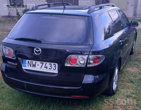 Black Mazda 6 2006 in Tukums, with an engine capacity of 2.00 L and mileage of 253 thousand km for 1200 €, photo 3 on AUTOMOTO.COM.LV