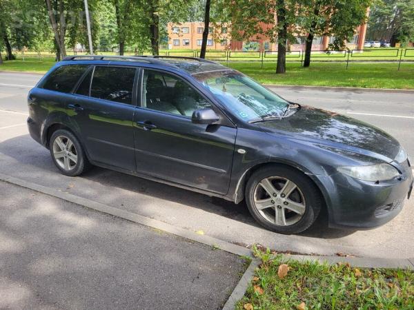 Black Mazda 6 2007 in Riga, with an engine capacity of 2.00 L and mileage of 329 thousand km for 650 €, photo 2 on AUTOMOTO.COM.LV
