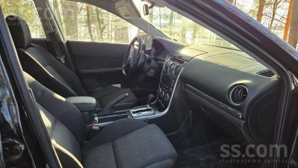 Black Mazda 6 2007 in Daugavpils, with an engine capacity of 2.30 L and mileage of 246 thousand km for 2200 €, photo 8 on AUTOMOTO.COM.LV