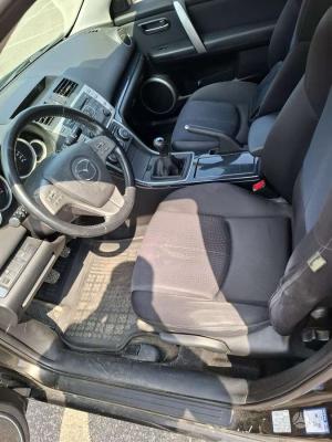 Black Mazda 6 2008 in Panevezys, with an engine capacity of 2.00 L and mileage of 307 thousand km for 2200 €, photo 13 on AUTOMOTO.COM.LV