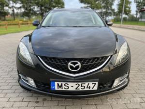 Black Mazda 6 2009 in Riga, with an engine capacity of 2.00 L and mileage of 238 thousand km for 3500 €, photo 4 on AUTOMOTO.COM.LV